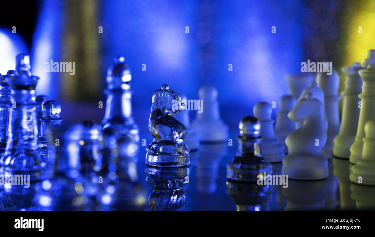Chess game with glass transparent chess on translucent chessboard ...