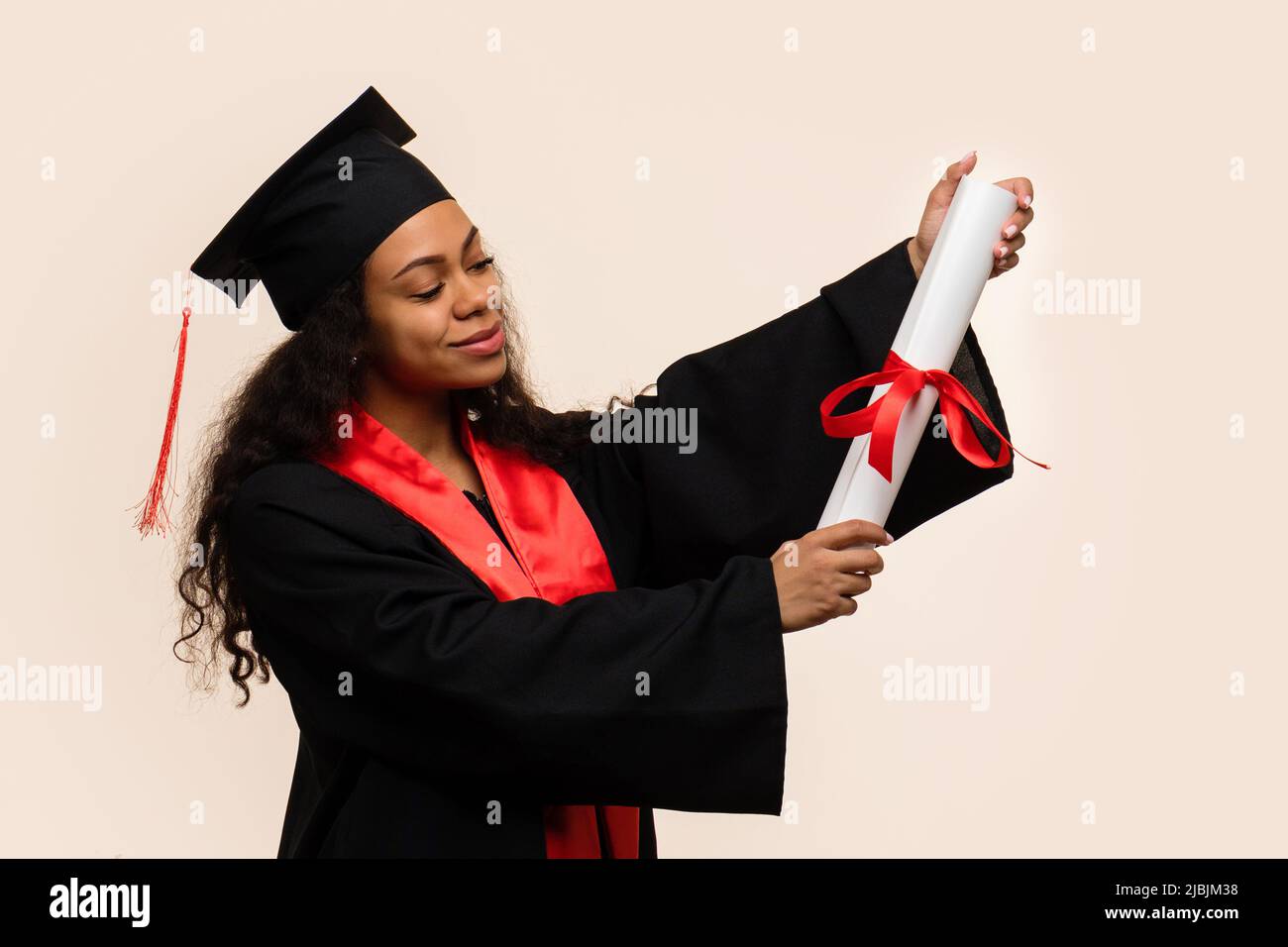 College student receiving her diploma hi-res stock photography and ...