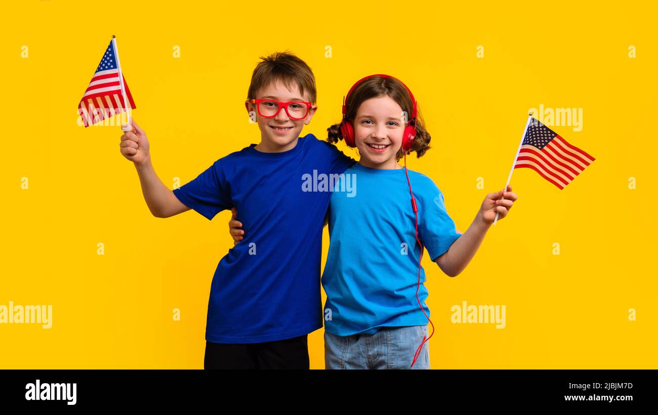 Happy Smart Brother and Sister 9-11 y.o in Blue Basic T-shirts Posing ...