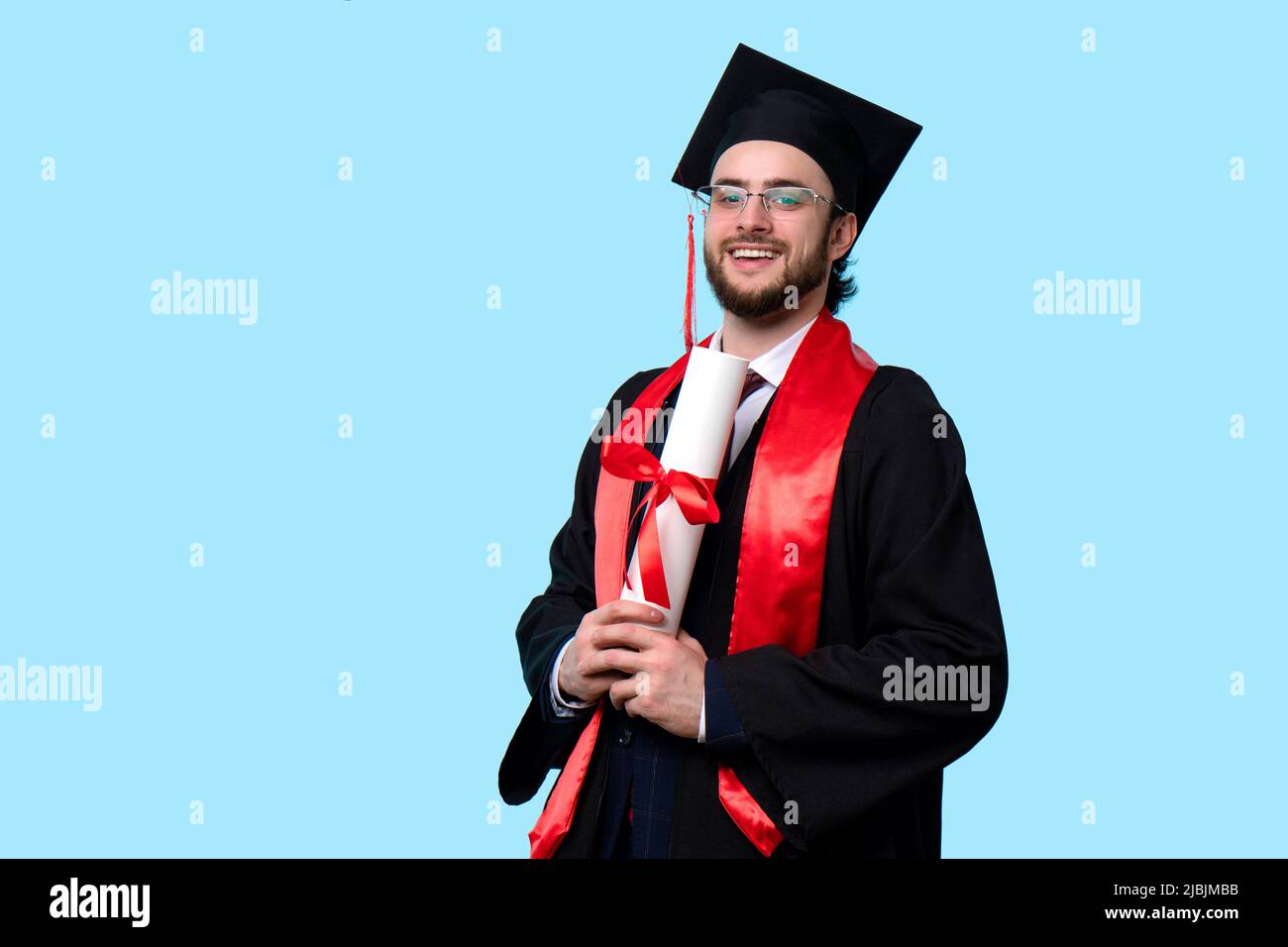Young Smiling Beard Guy in Mortarboard Celebrating Graduation and ...