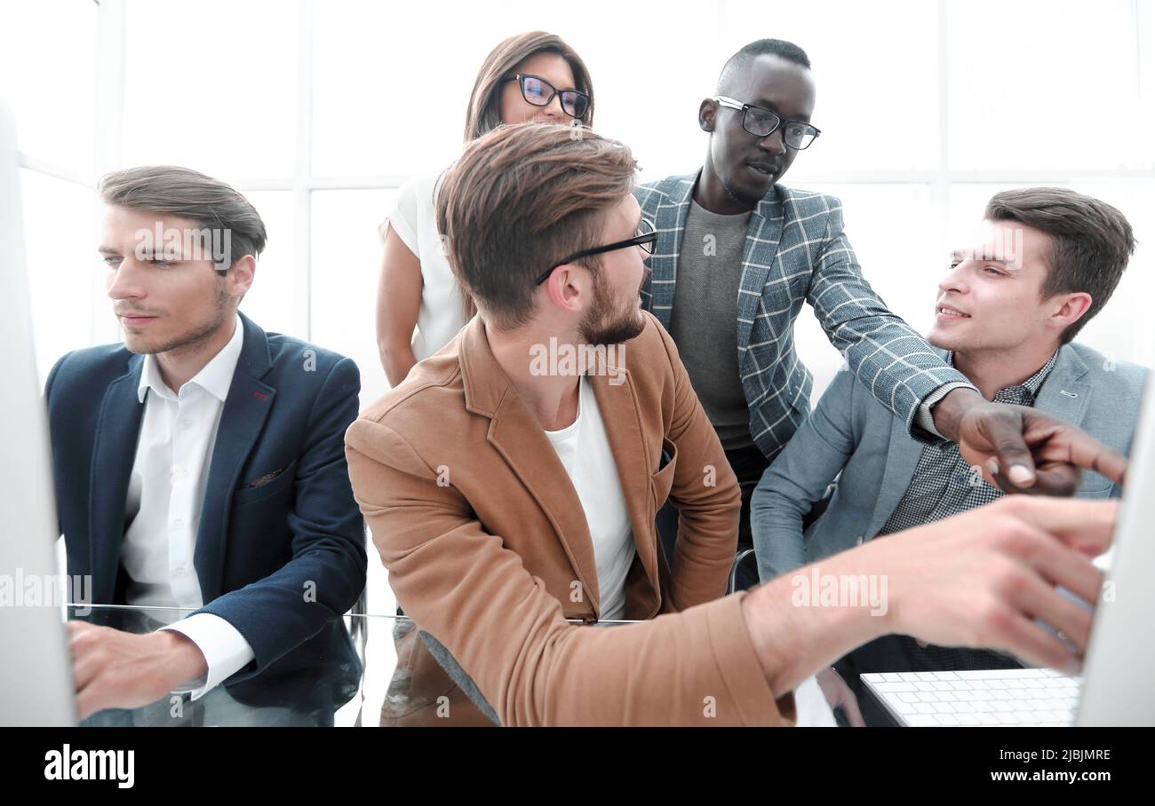 Programmer working in a software developing company office Stock Photo ...