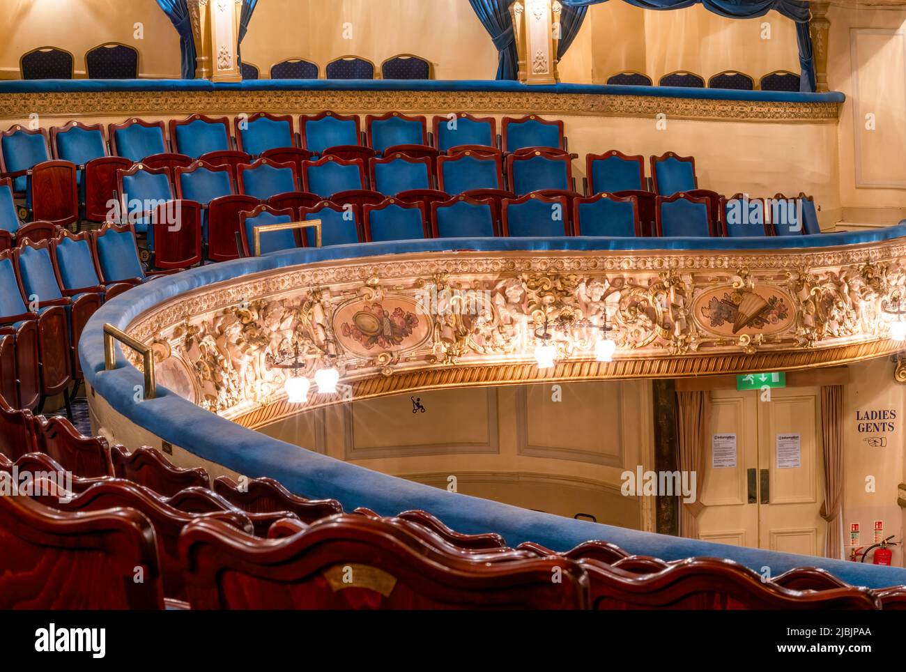 Rows of blue plush seats of the Grand Theatre in Blackpool, Lancashire ...