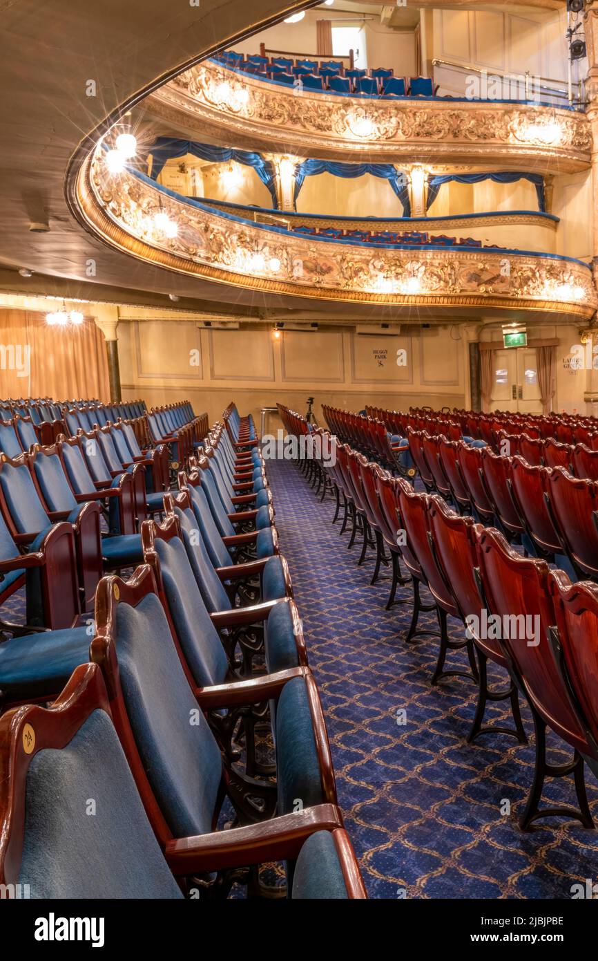 Rows of plush blue seats in the the Grand Theatre in Blackpool ...