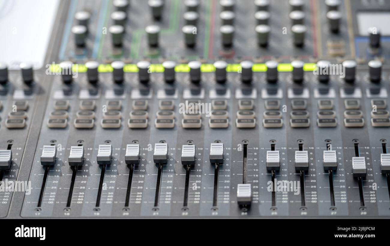 Sound and audio mixer control panel with buttons and sliders. Audio ...