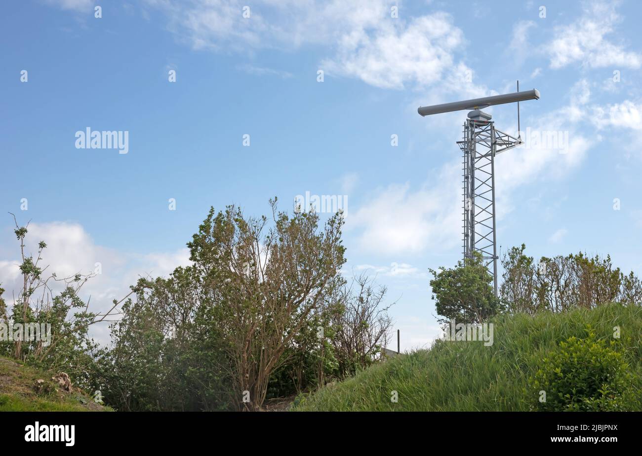 Marine traffic radar, small tower in a green area Stock Photo - Alamy
