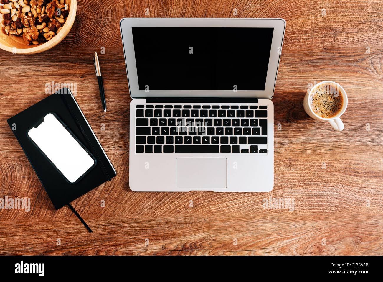 Working at home concept, top view of workspace with laptop computer and ...