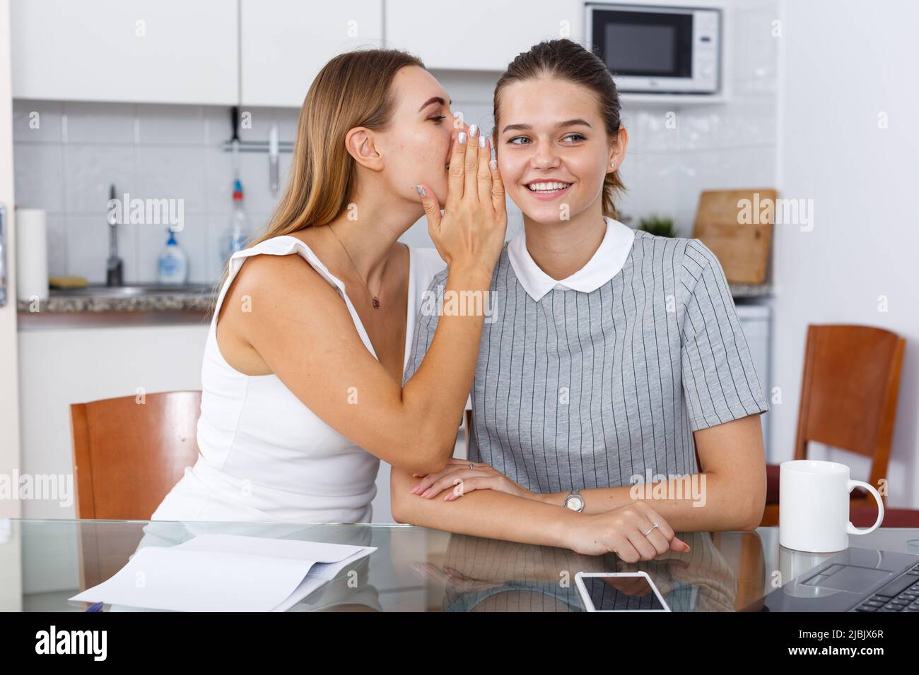 Two girls girlfriend sitting hi-res stock photography and images - Alamy