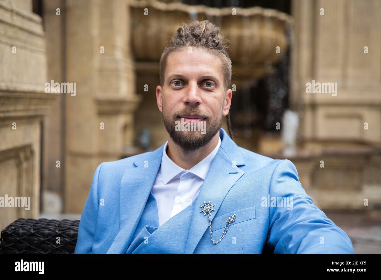 Portrait of a young man in his 20s - 30s with a hipster look in a ...