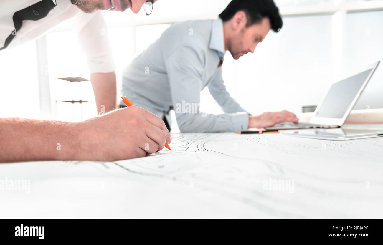 close up.architects make sketches for a new project Stock Photo - Alamy