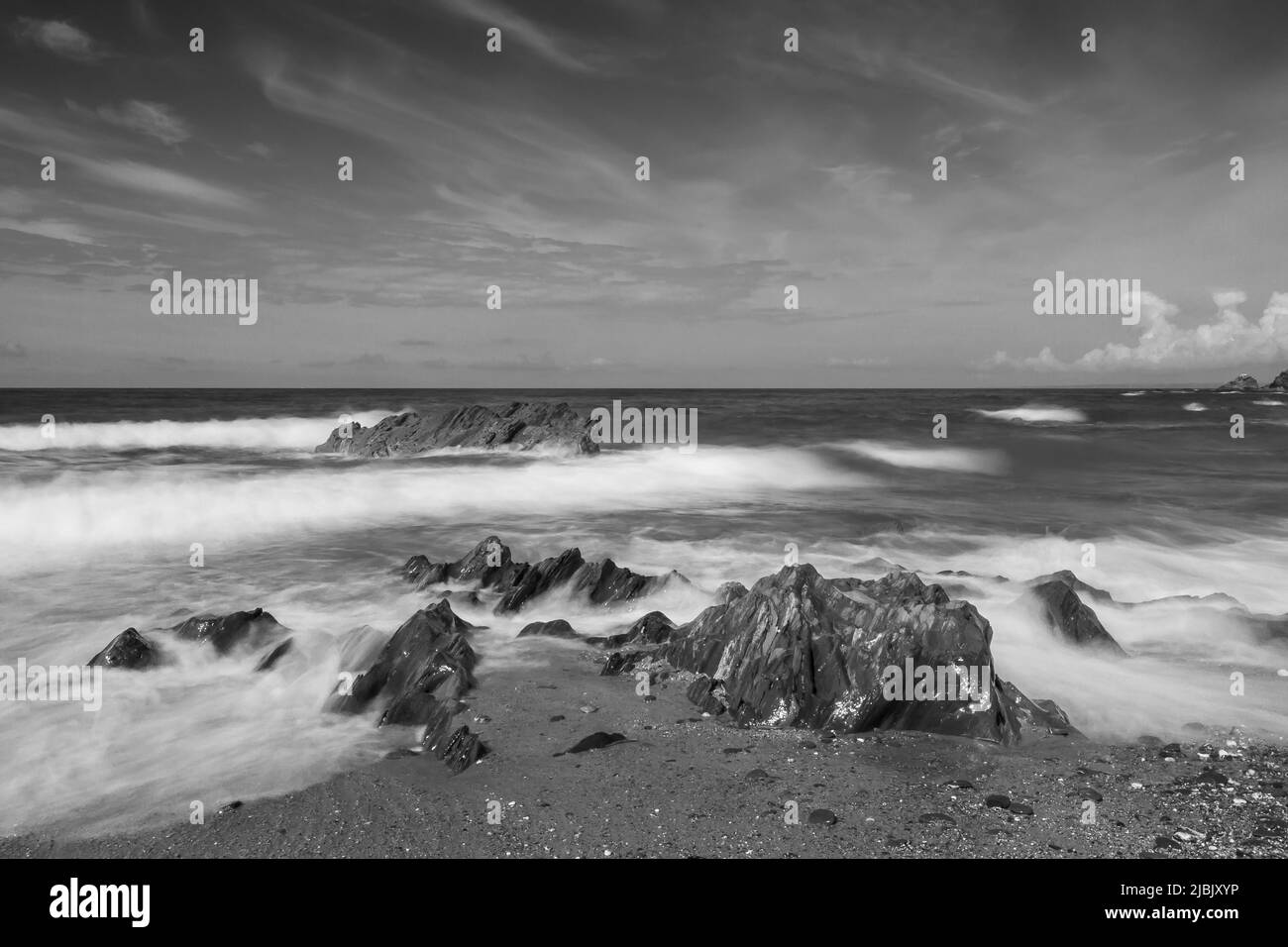 Long exposure image of waves breaking over rocks on the North Cornish ...