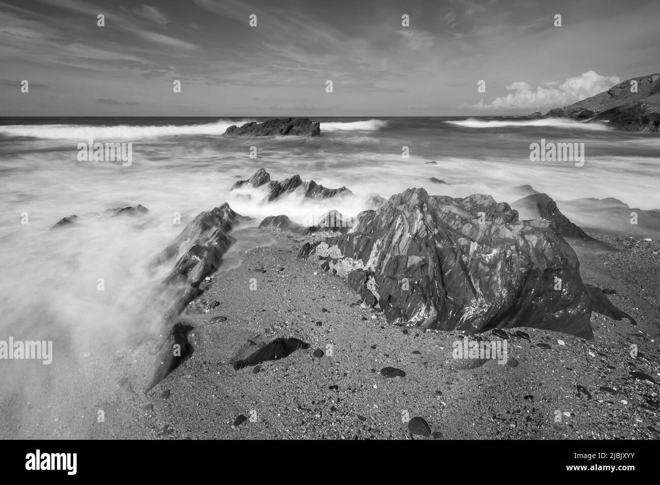 Long exposure image of waves breaking over rocks on the North Cornish ...