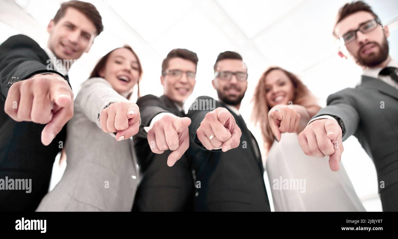 close up.successful business team pointing at you Stock Photo - Alamy