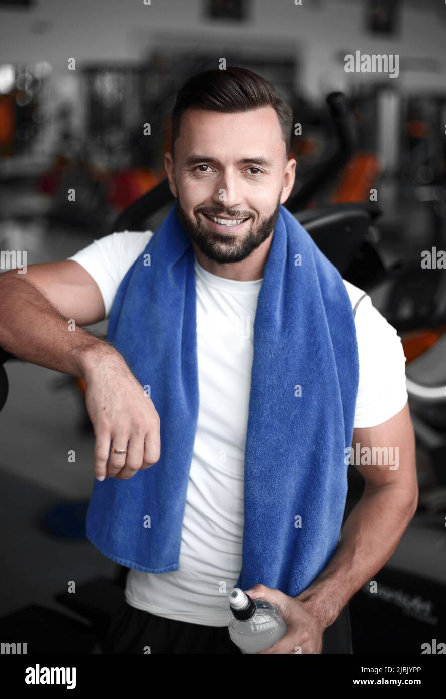 close up.confident sports man in the gym Stock Photo - Alamy