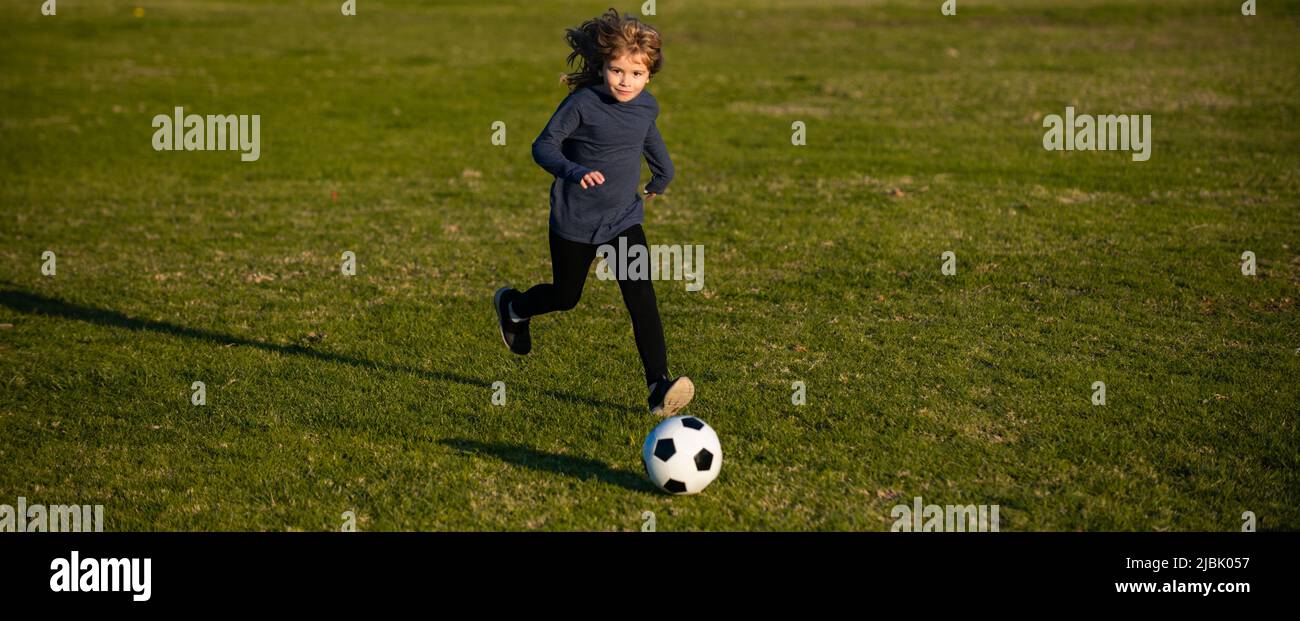 Soccer kid boy playing football. Child boy play football on outdoor ...