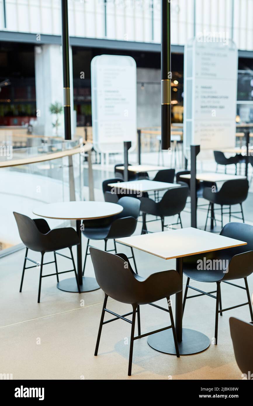 Minimal background image of minimal food court interior in black and ...