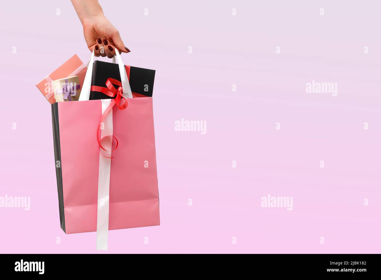 Female hand holds pack hi-res stock photography and images - Alamy