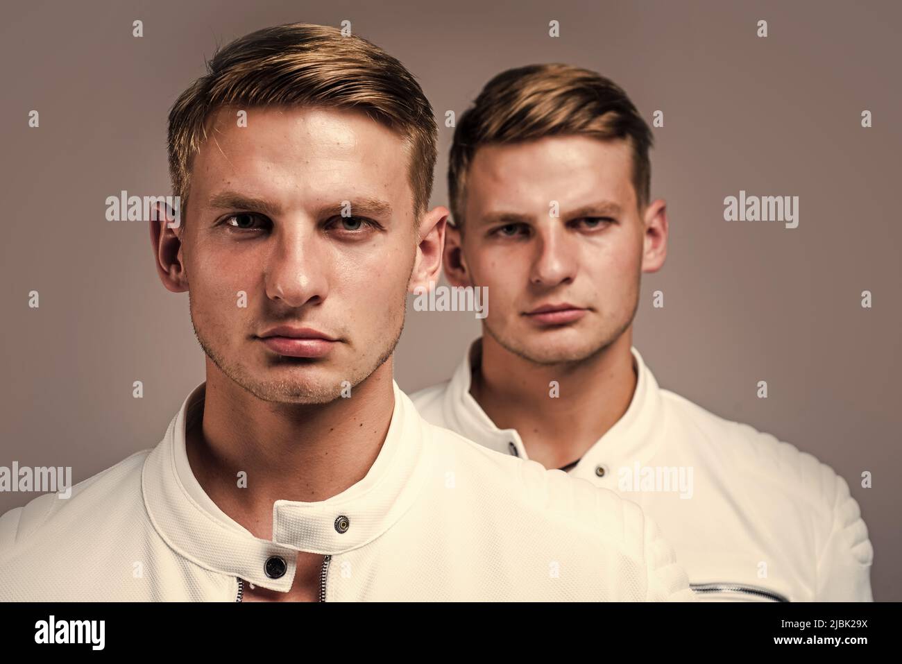 twins brother in white. male beauty and fashion. similar appearance ...