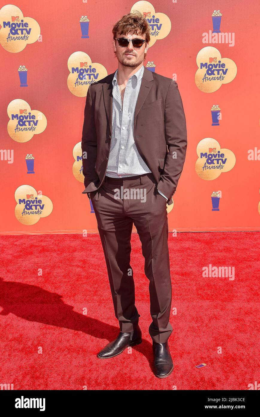 Alex Roe attends the 2022 MTV Movie and TV Awards at Barker Hangar in ...