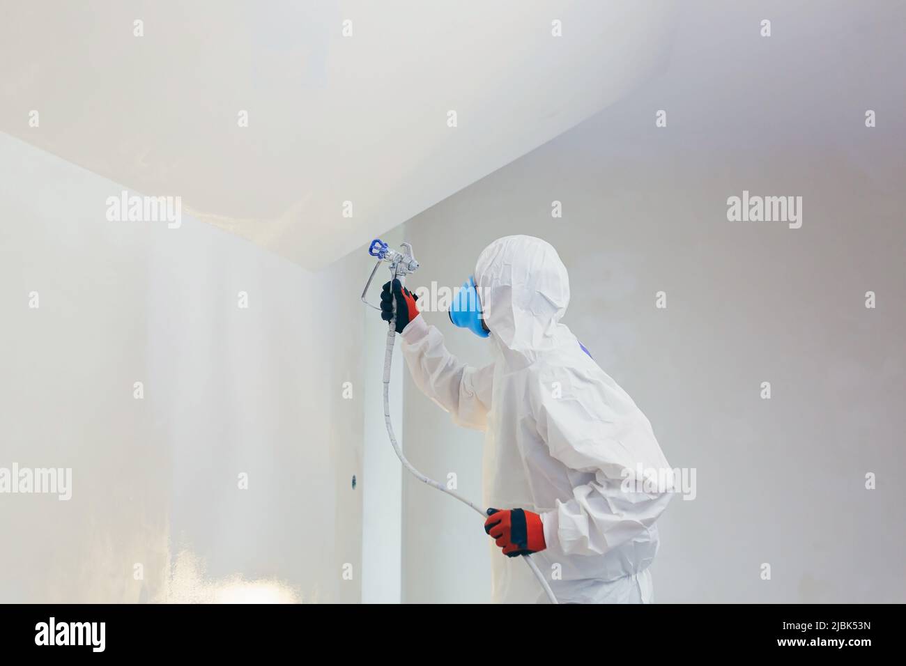 Worker spray paints one hi-res stock photography and images - Alamy