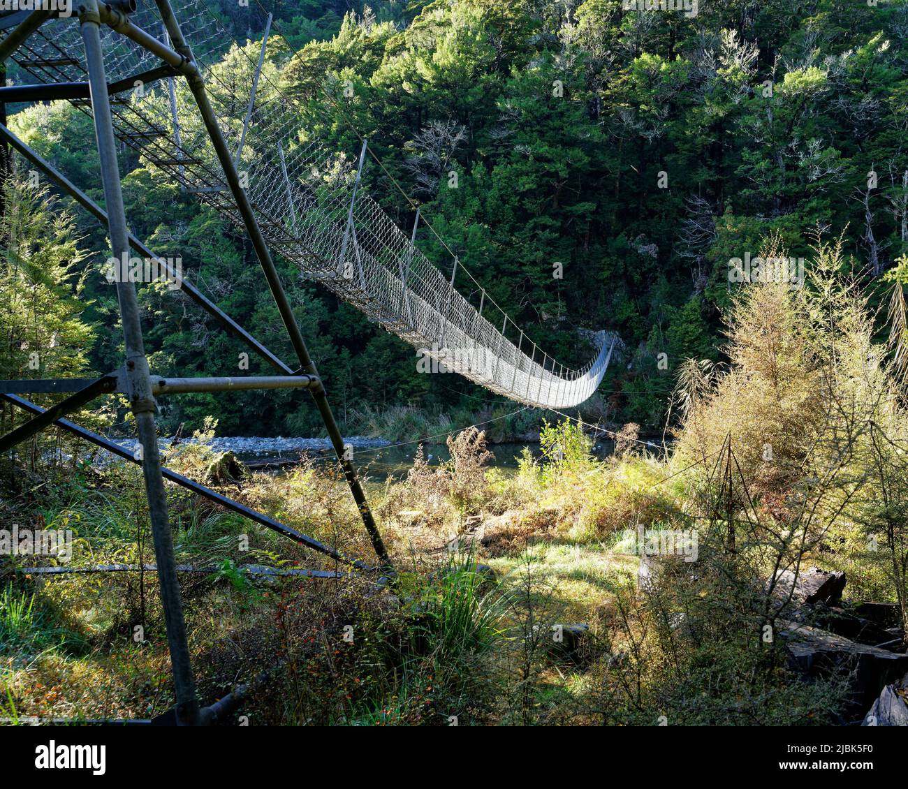 High swing bridge over the Travers River, Nelson Lakes National Park ...