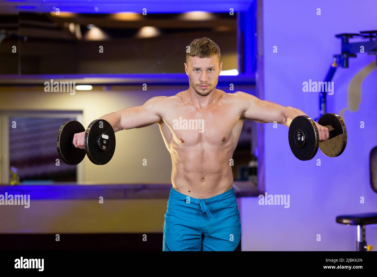 Athletic man doing exercises hi-res stock photography and images - Alamy