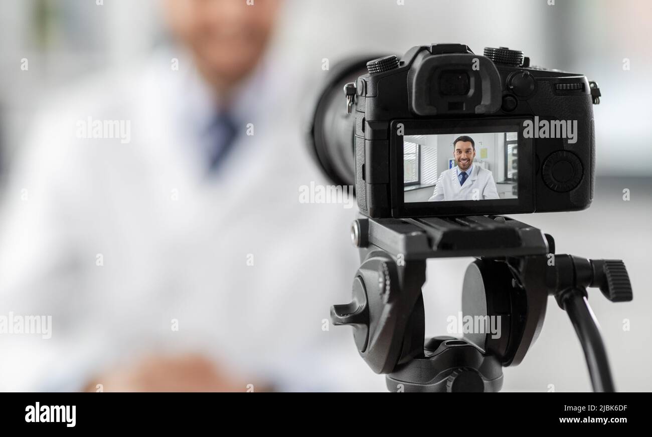 male doctor recording video blog at hospital Stock Photo - Alamy
