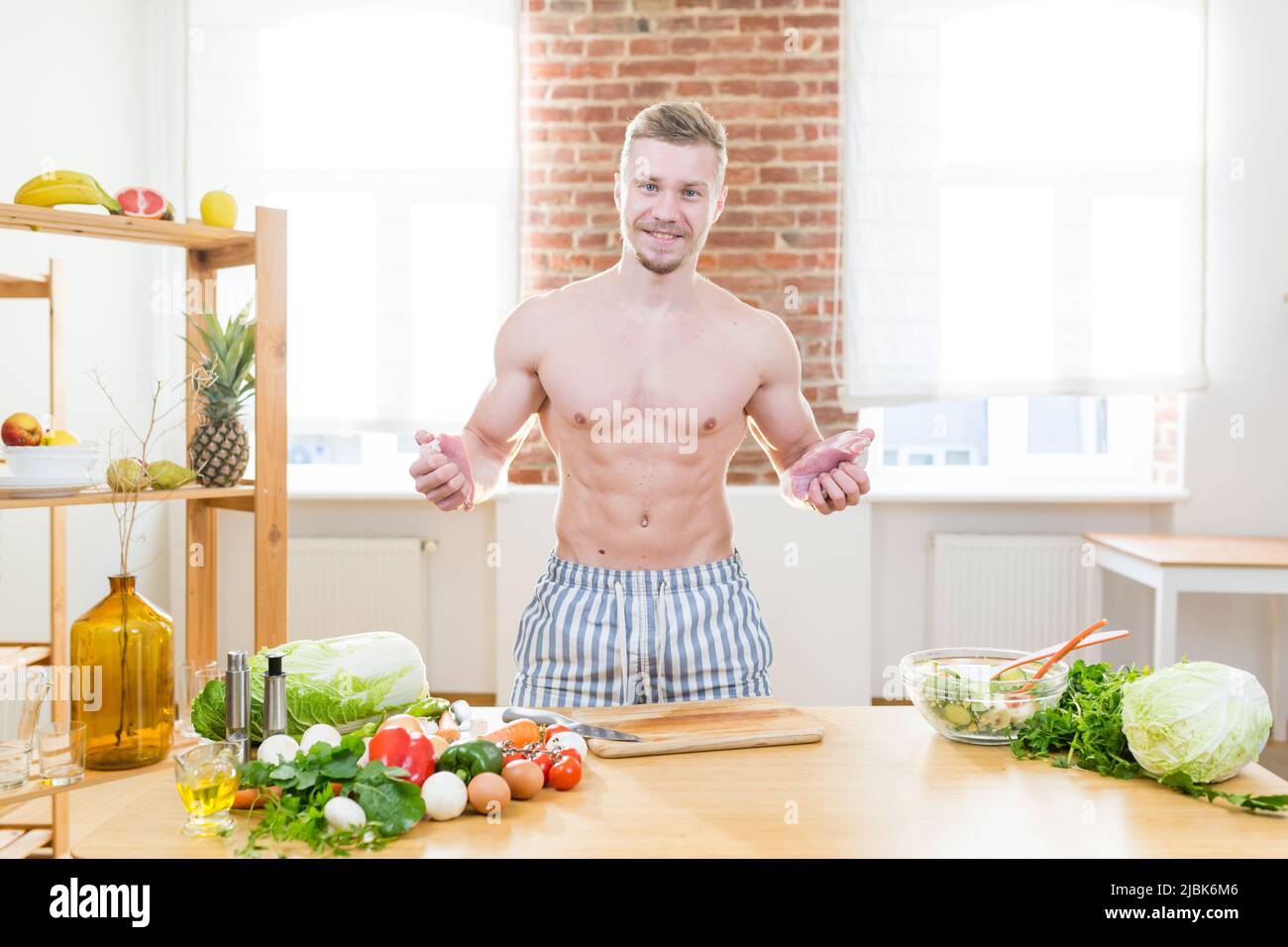 Portrait handsome blond muscular young hi-res stock photography and ...