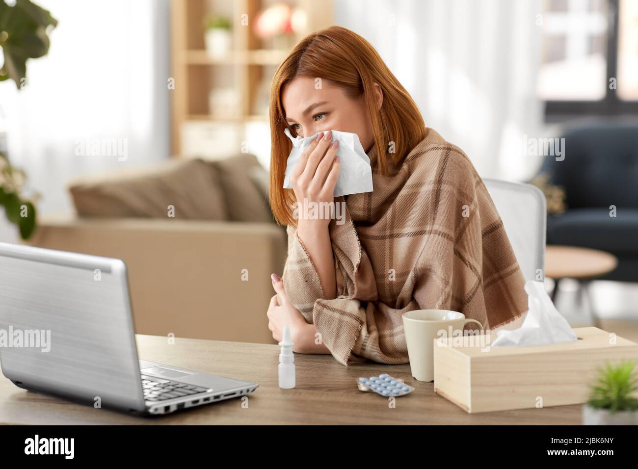 sick woman having video call on tablet pc at home Stock Photo - Alamy