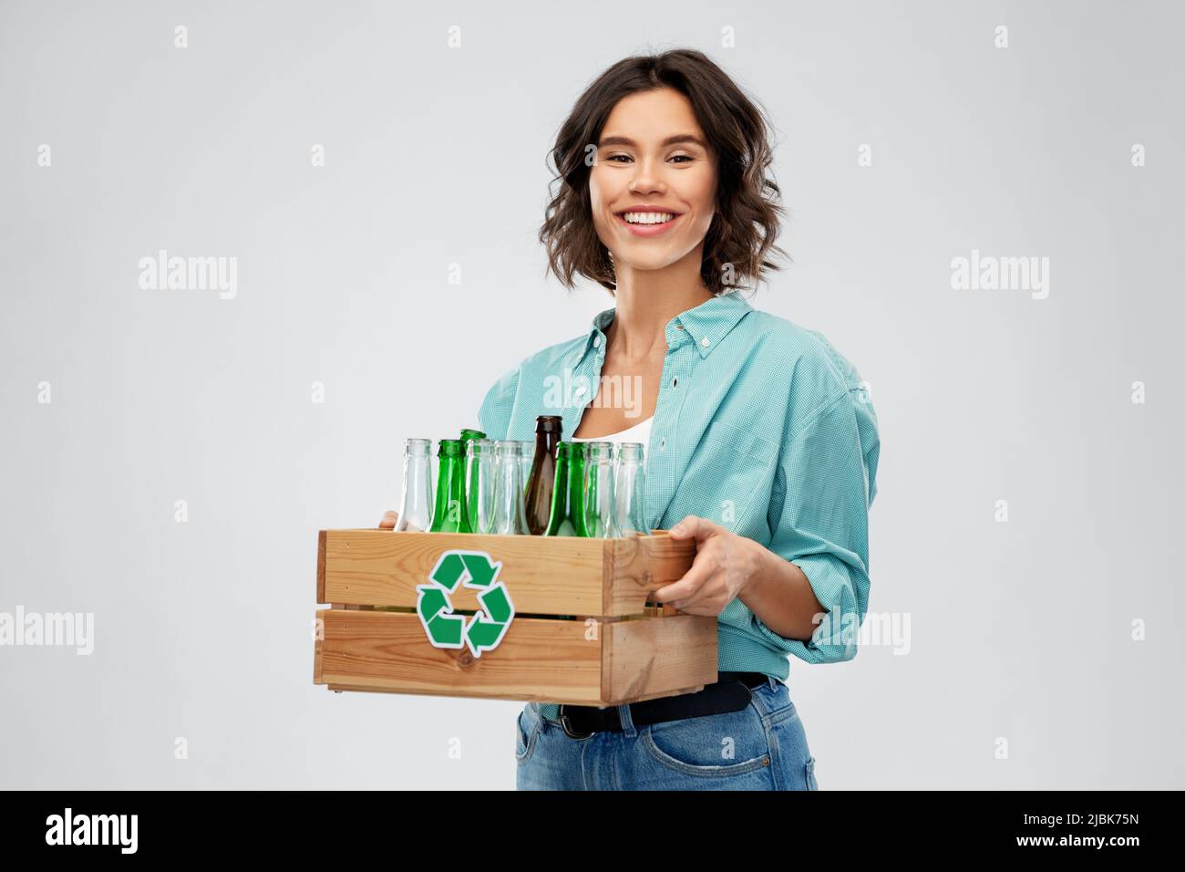 Young woman sorting glass hi-res stock photography and images - Alamy