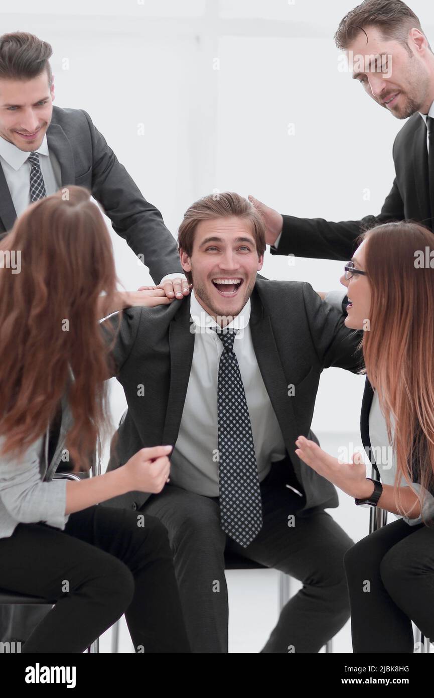 Hugging business people toasting to celebrate success Stock Photo - Alamy