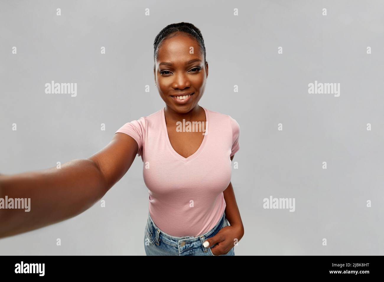 happy african american woman taking selfie Stock Photo - Alamy
