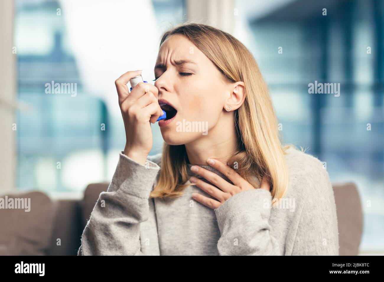 Asthma inhaler blue adult hi-res stock photography and images - Alamy