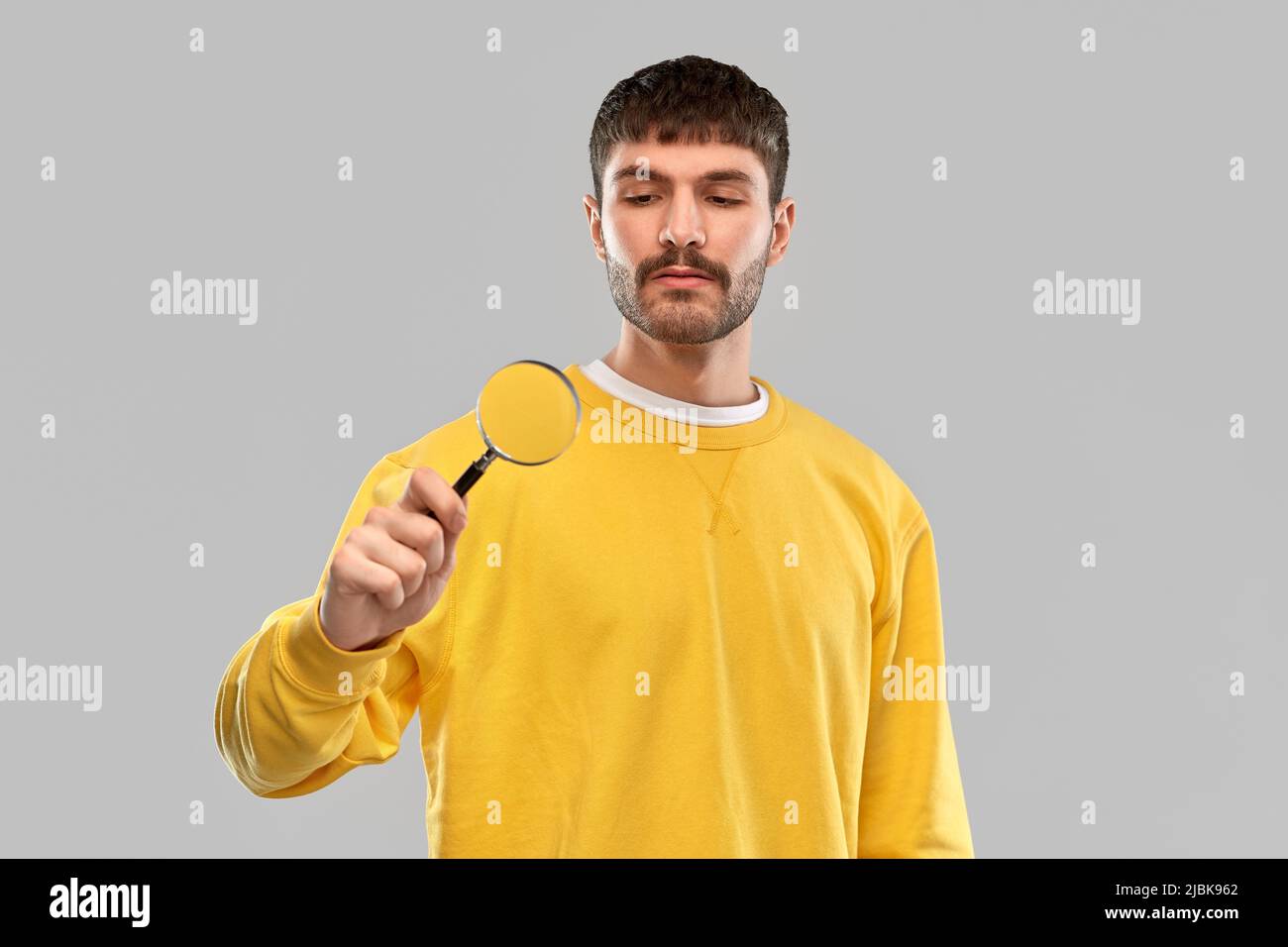 Man magnifier hi-res stock photography and images - Alamy