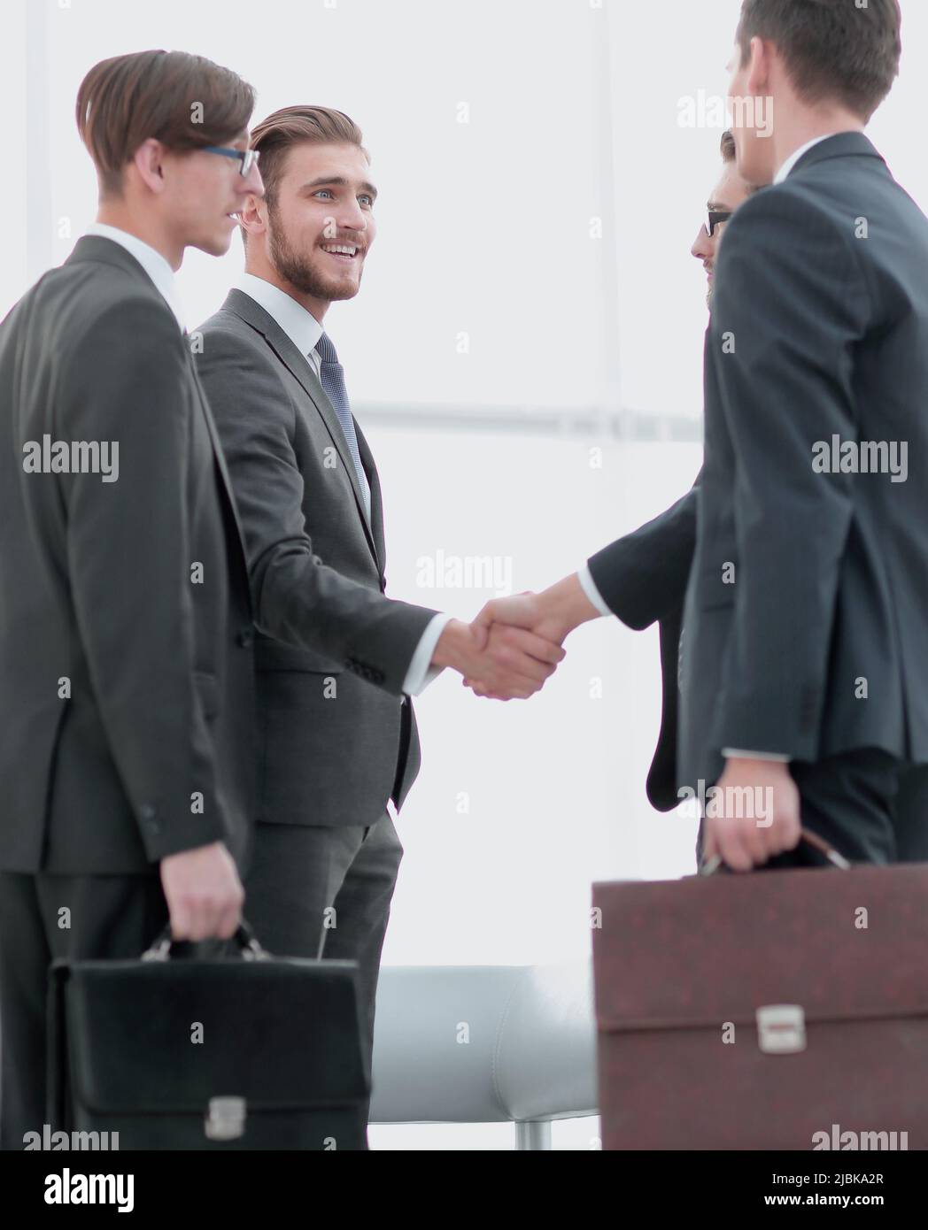 welcome handshake of business partners Stock Photo - Alamy