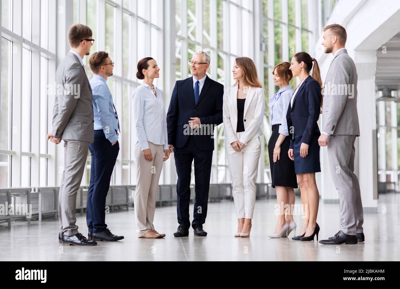 business people talking at office building Stock Photo - Alamy