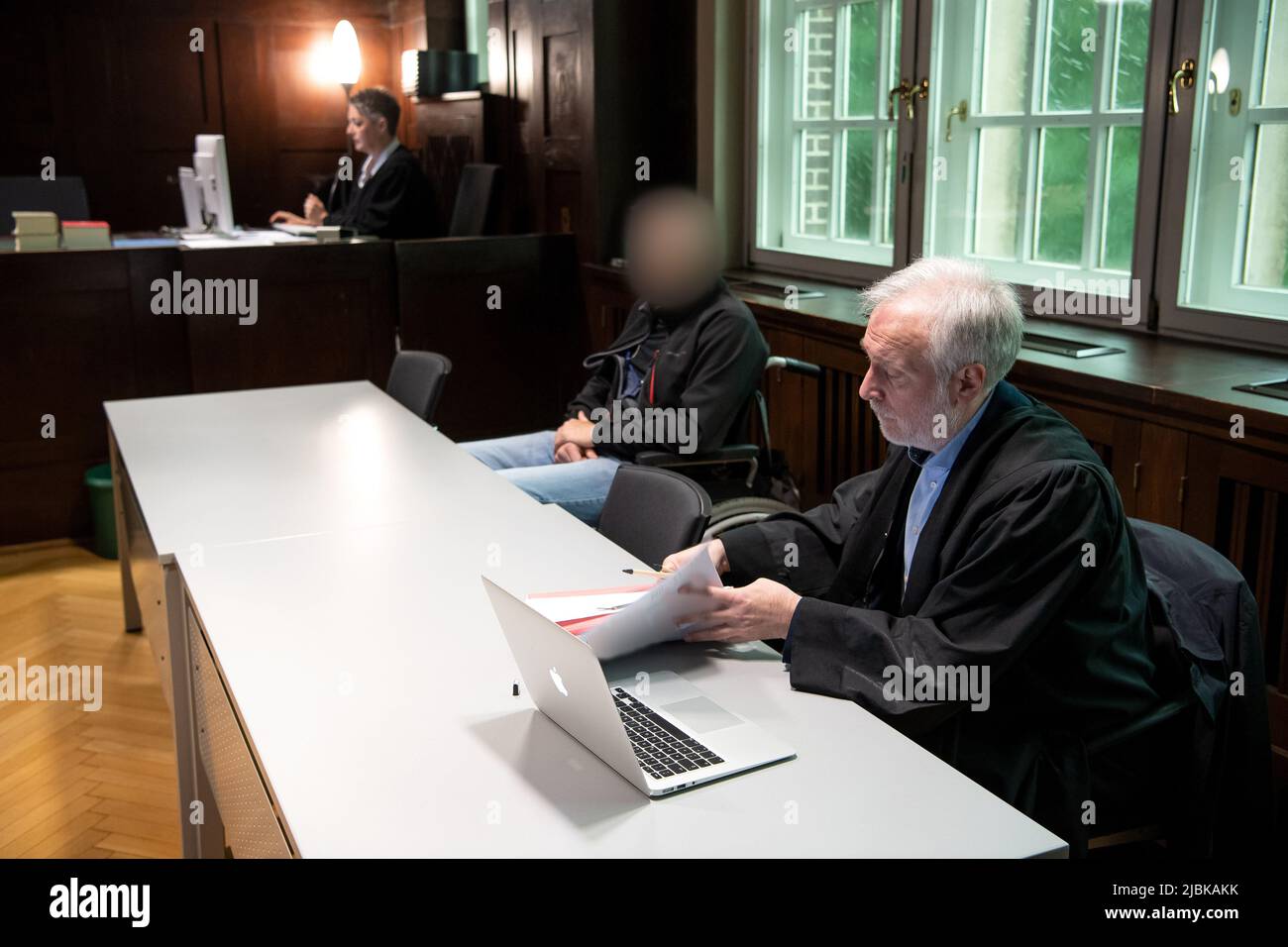 Emden, Germany. 07th June, 2022. The defendant (center) sits in the ...