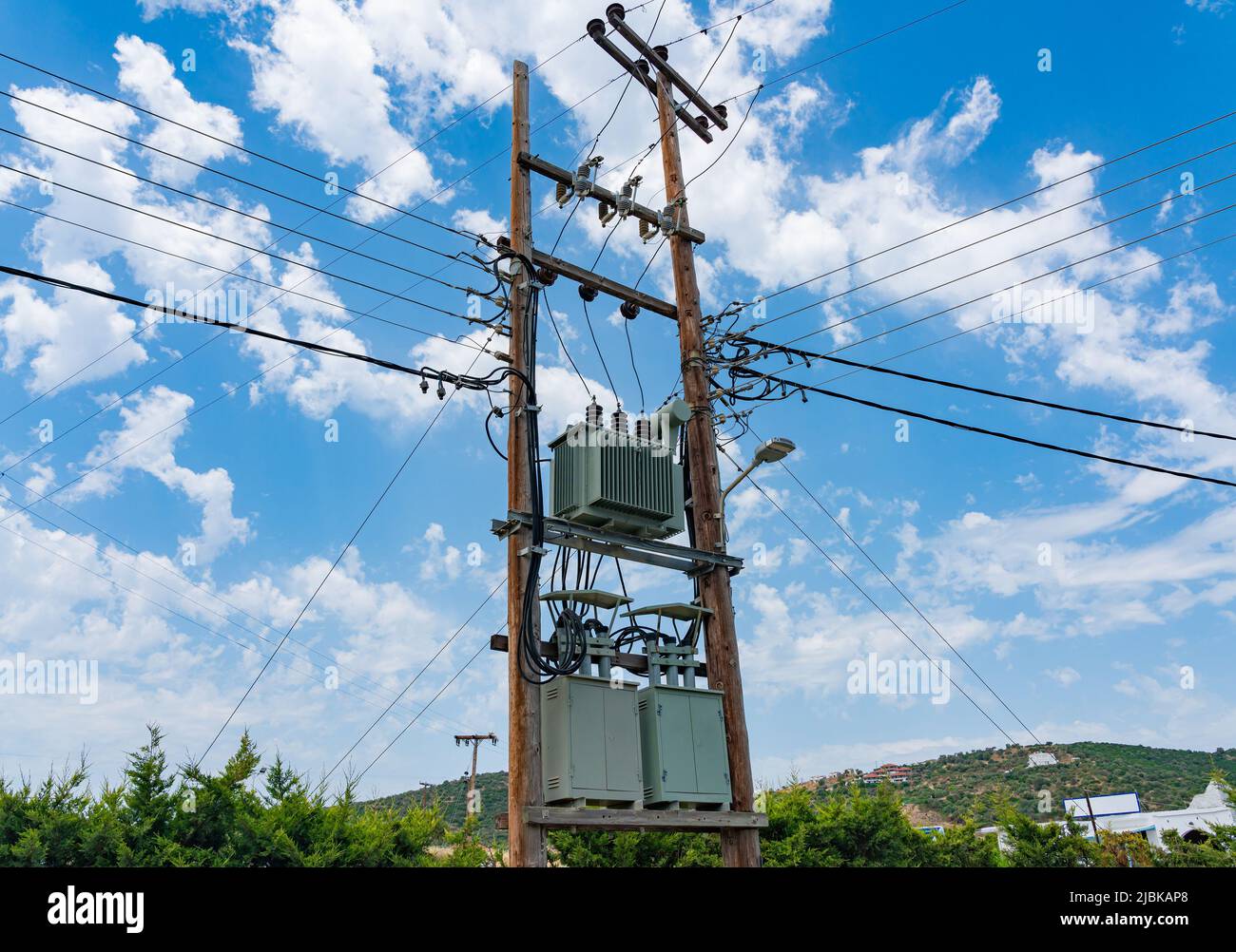 Electrical transformer mounted on a street pole against the sky Stock ...