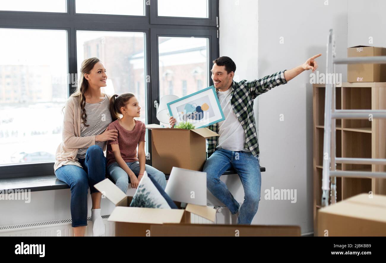 happy family with child moving to new home Stock Photo - Alamy