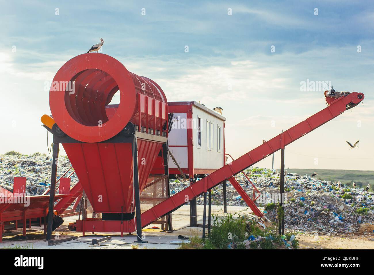 sorting machine at a large landfill Stock Photo - Alamy