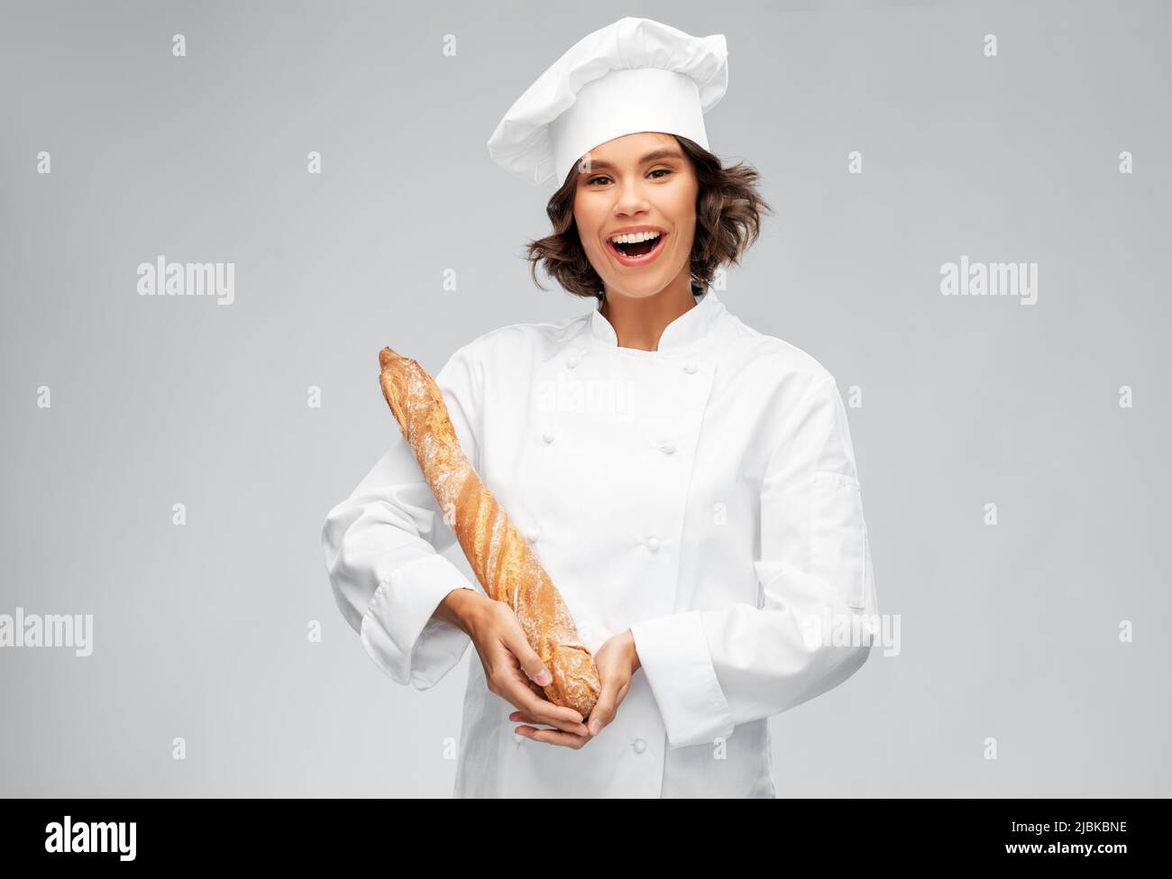 Woman holding loaf french bread hi-res stock photography and images - Alamy