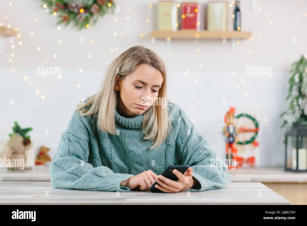 Beautiful lonely depressed woman left alone on Christmas Eve, sadly ...