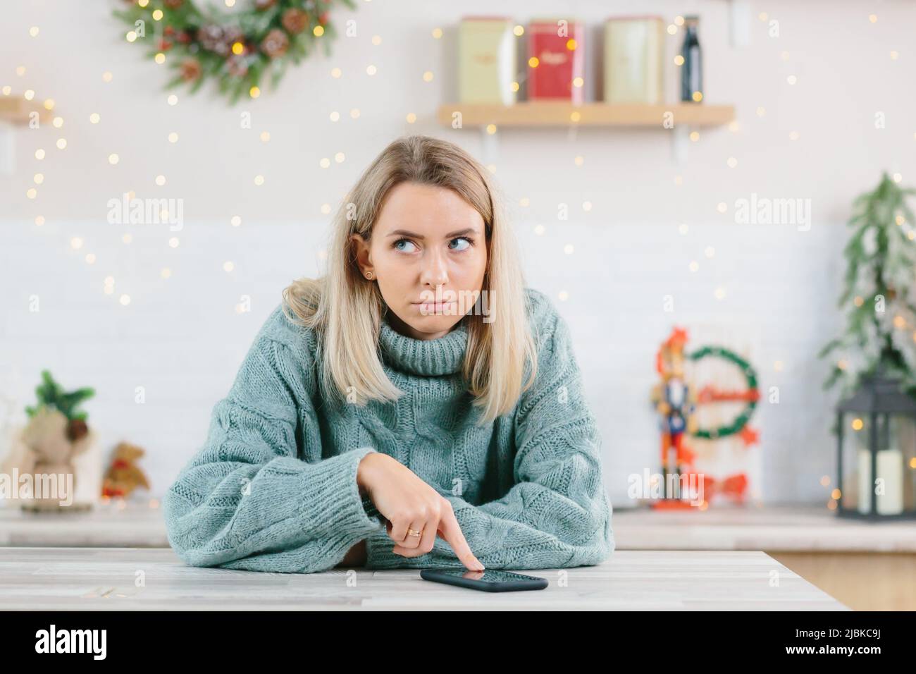 Beautiful lonely depressed woman left alone on Christmas Eve, sadly ...