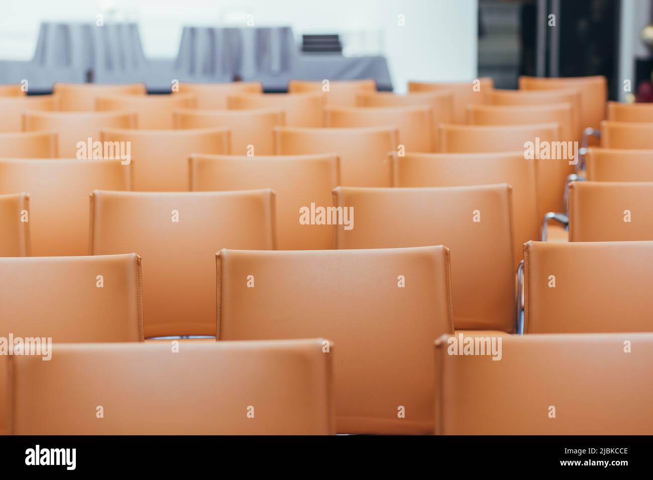 large empty conference room with orange chairs before the auction Stock ...