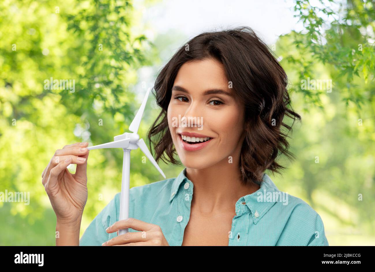 Smiling young woman wind hi-res stock photography and images - Alamy