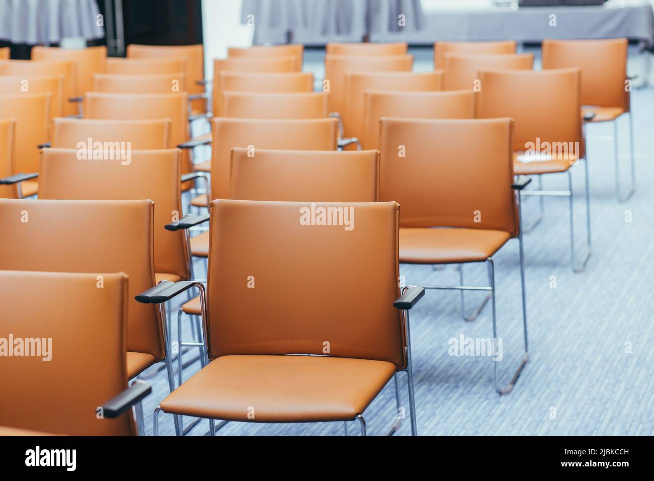 large empty conference room with orange chairs before the auction Stock ...