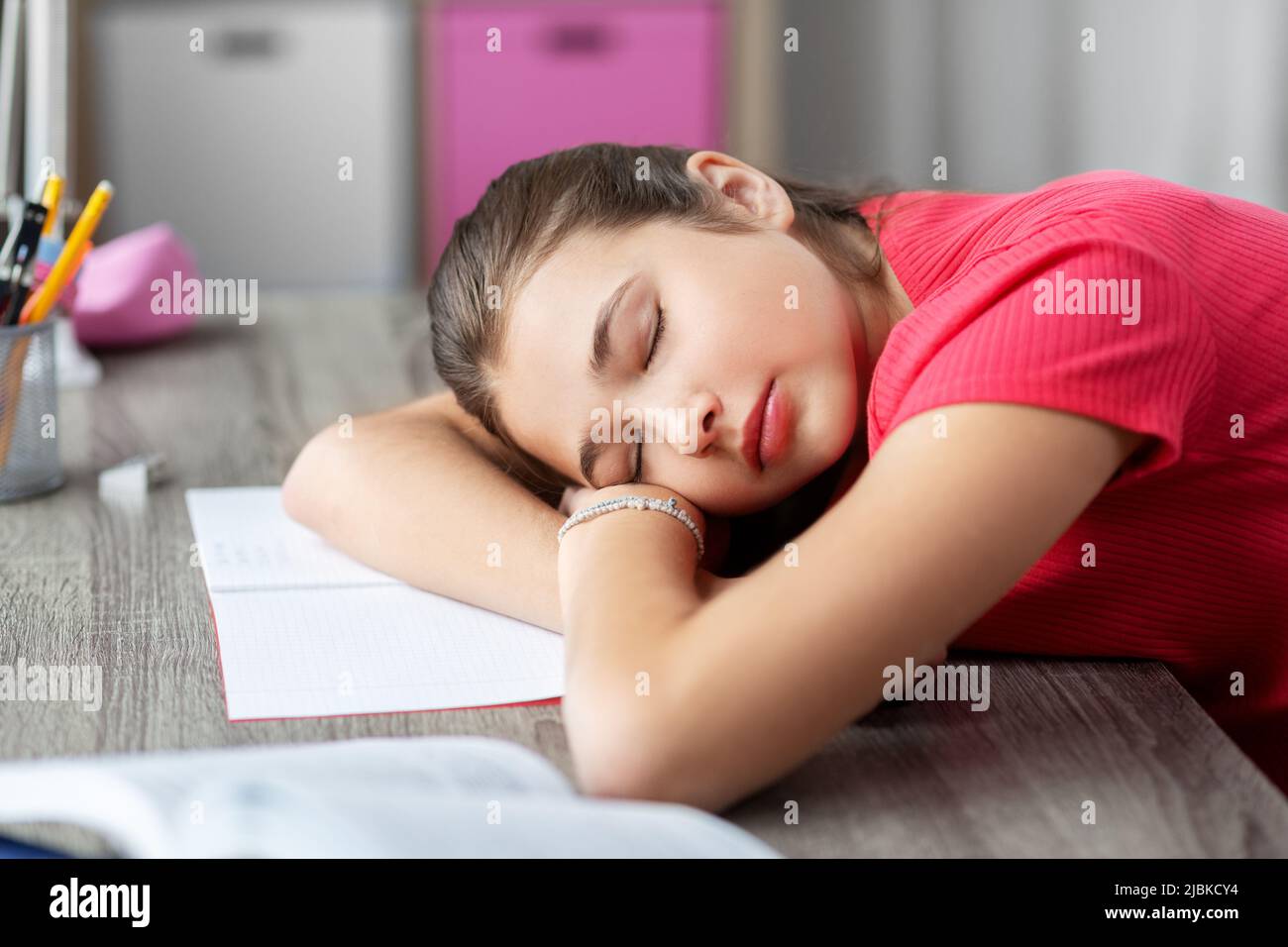 Tired school girl sleeping on hi-res stock photography and images - Alamy