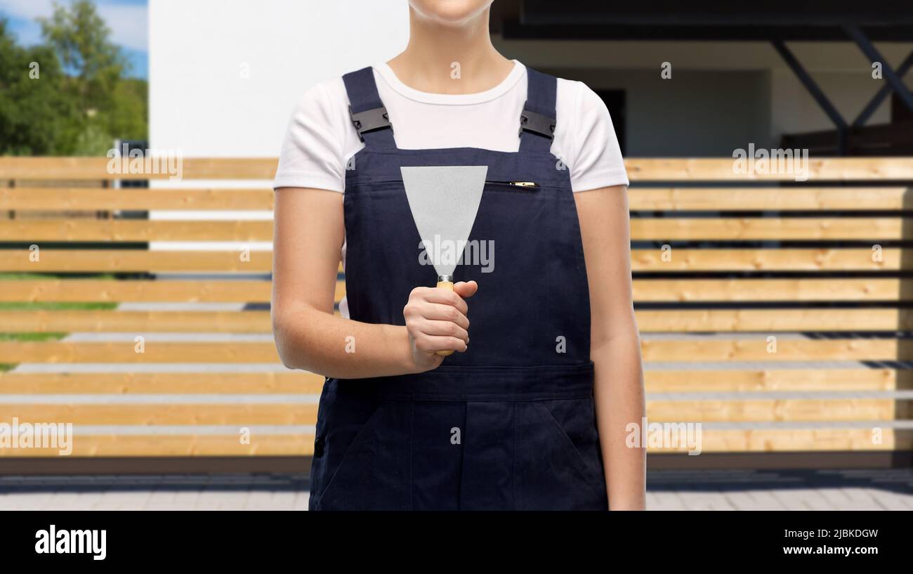 Worker putty knife hi-res stock photography and images - Alamy