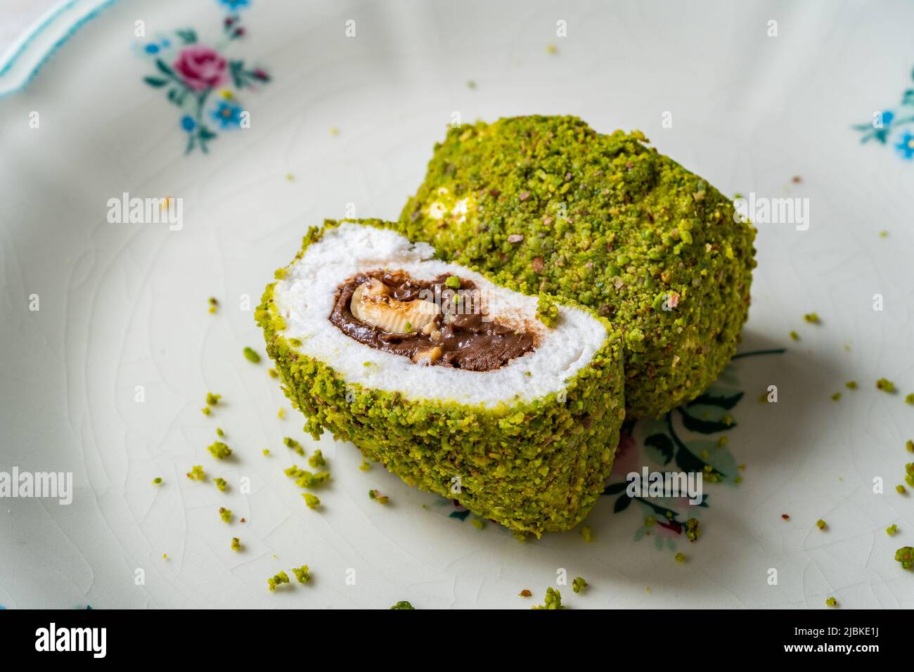 Turkish specific dessert muska pestil with pistachio powder and ...