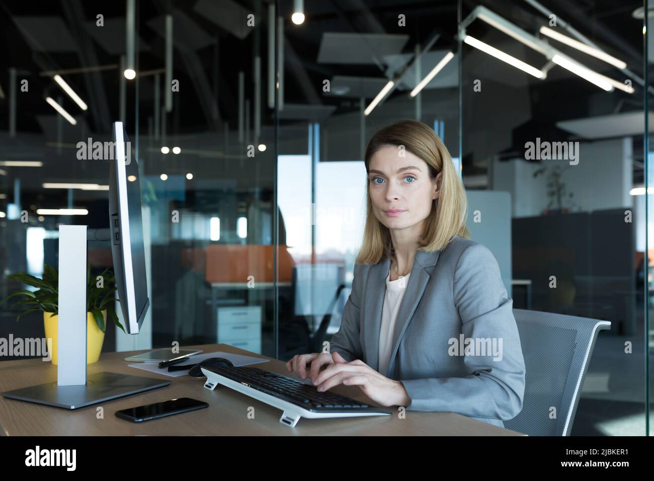 Portrait of a sensible and fair successful woman, businesswoman working ...