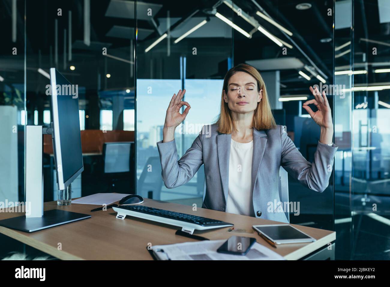 Person trying to balance hi-res stock photography and images - Alamy